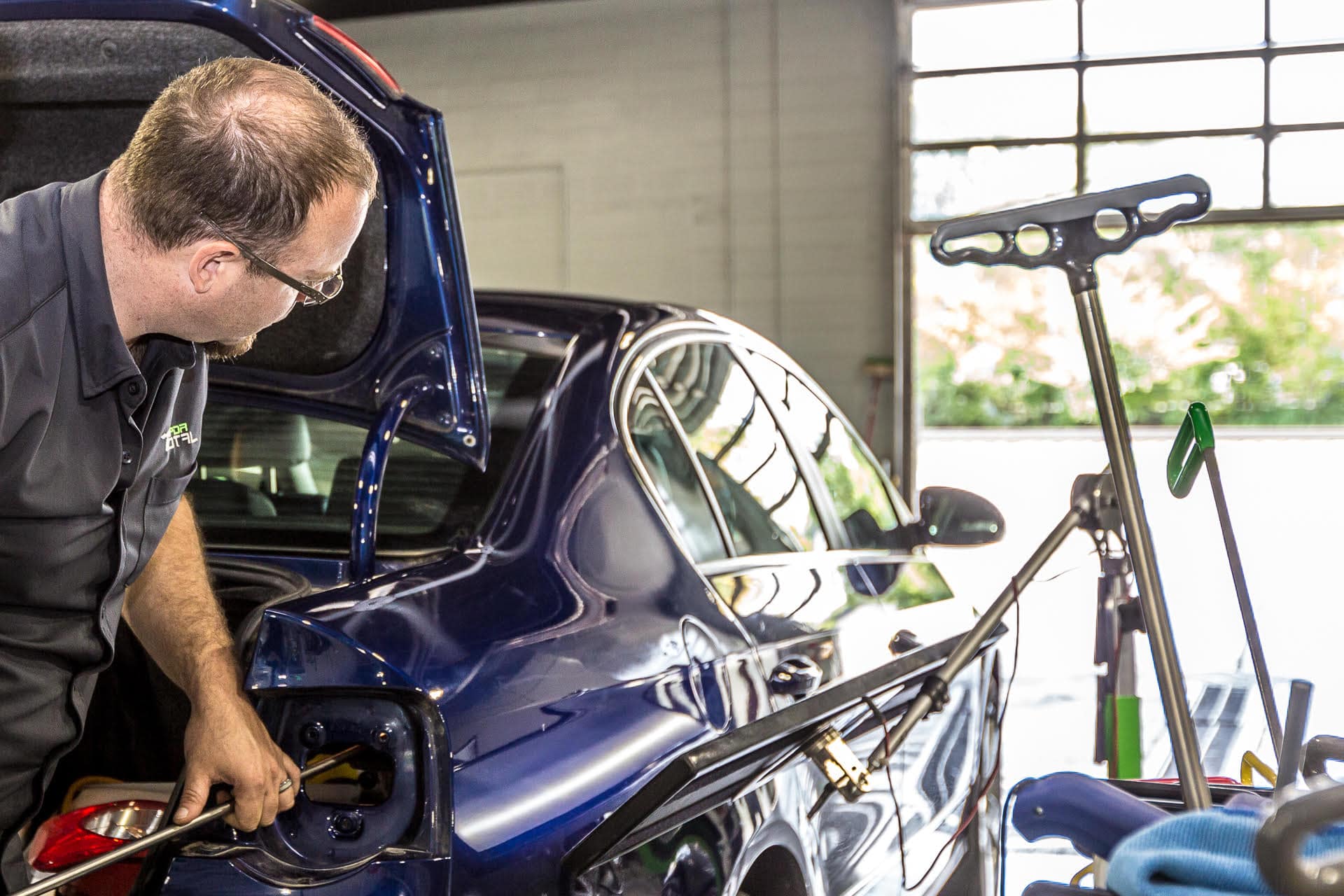 Paintless dent removal - Total Collision & PDR Repair Shop